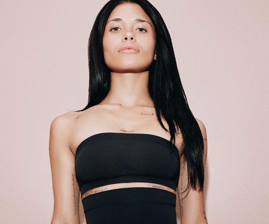 Ice Spice, Pinkpantheress, Nessa Barrett, & Raye Debut New SKIMS Shapewear