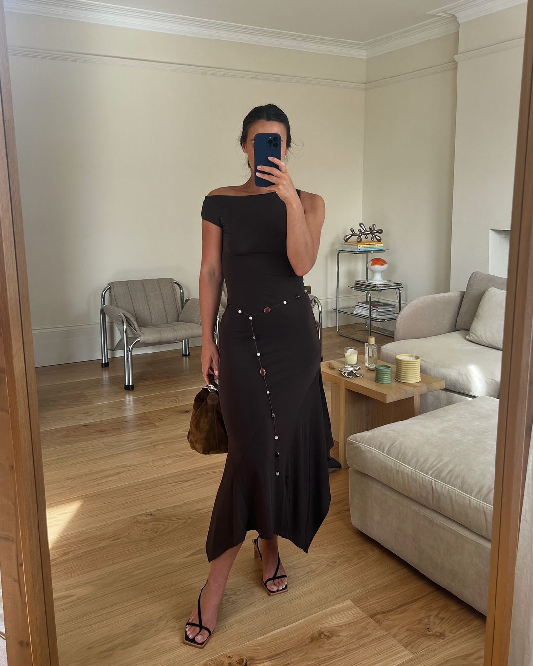 A Statement Belt Elevates Any Dress