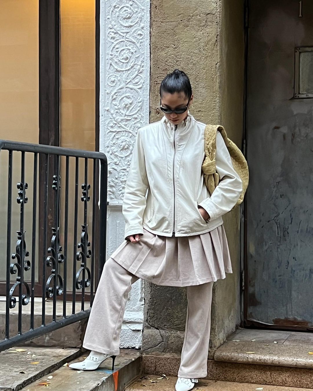 10 Ways To Master The Skirt Over Pants Trend