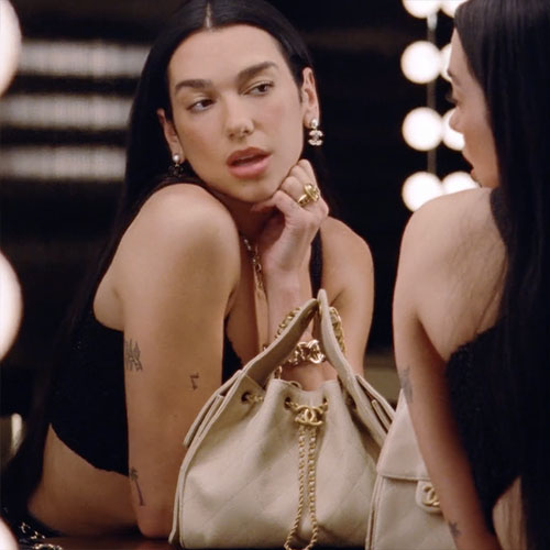 Dua Lipa Takes The Spotlight In CHANEL 25 Handbag Campaign