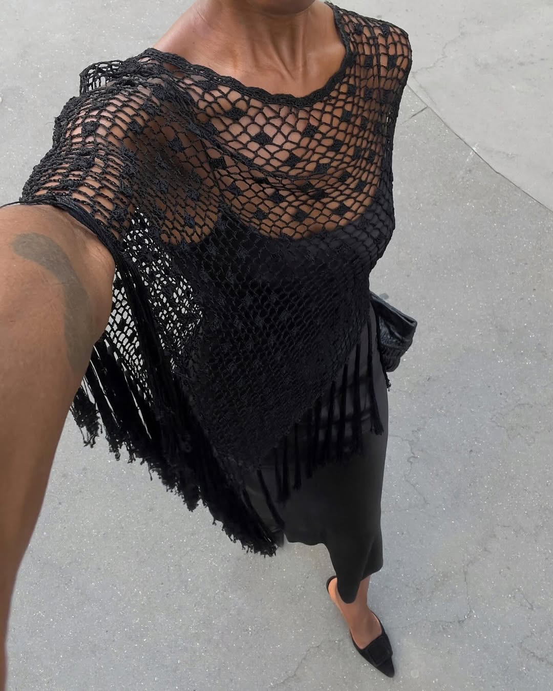 10 Poncho Outfits That Make Layering Look Effortless